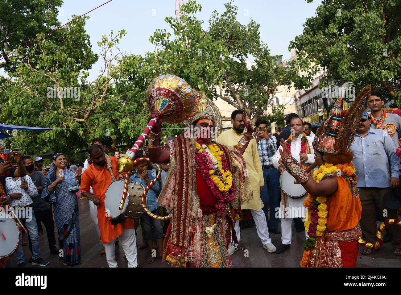 Men dress in costumes of Lord Hanuman ji dancing and blessing to ...
