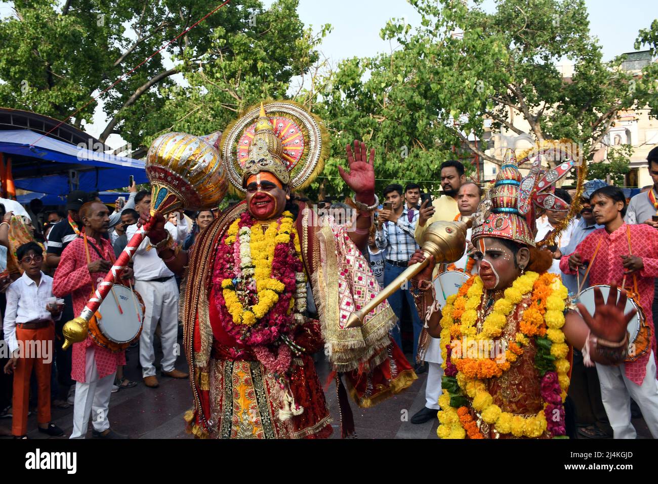 Men dress in costumes of Lord Hanuman ji dancing and blessing to ...