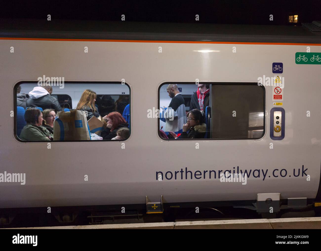 Northern rail passengers, rail commuters on a Northern Rail train Stock ...