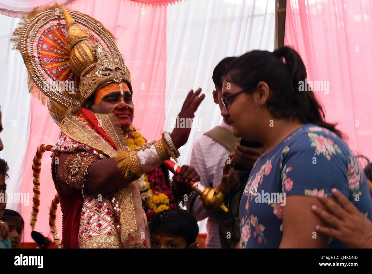 Men dress in costumes of Lord Hanuman ji dancing and blessing to ...