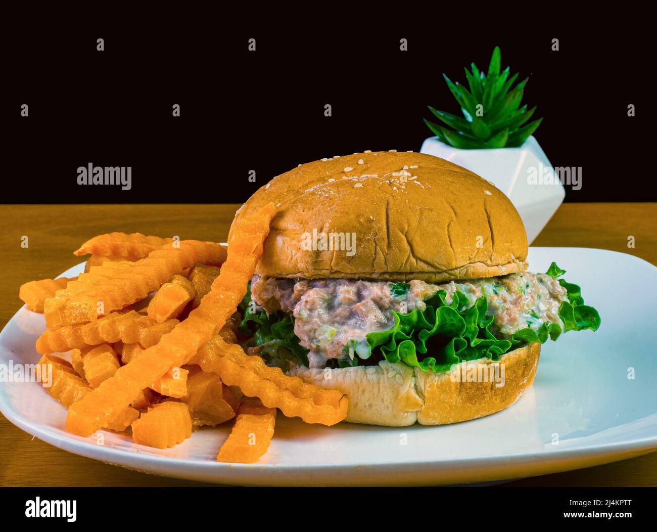 tuna salad sandwich served with butternut squash fries Stock Photo - Alamy