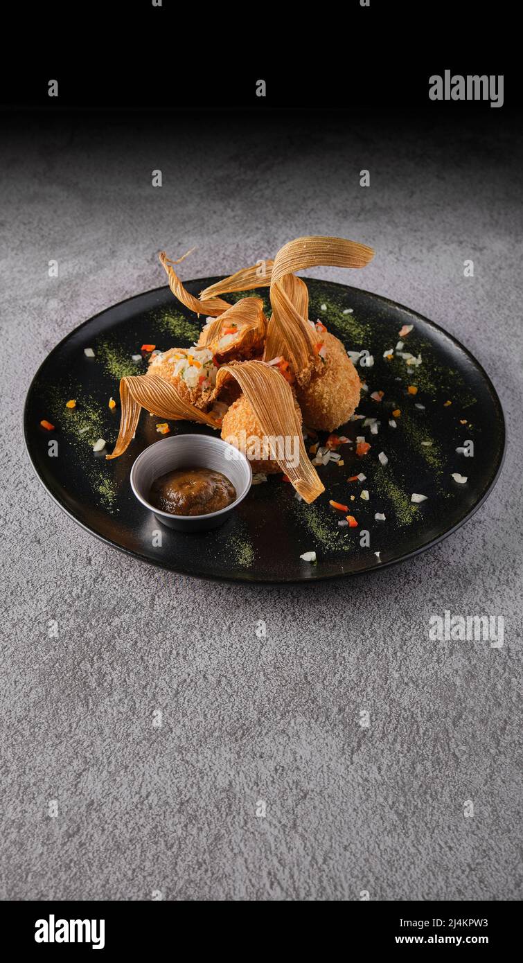Gourmet corn croquettes, delicious Peruvian corn balls, selective focus ...
