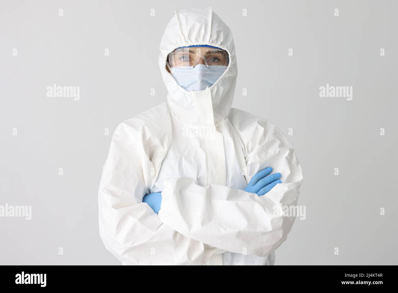Doctor wearing protective hazard suit hi-res stock photography and ...