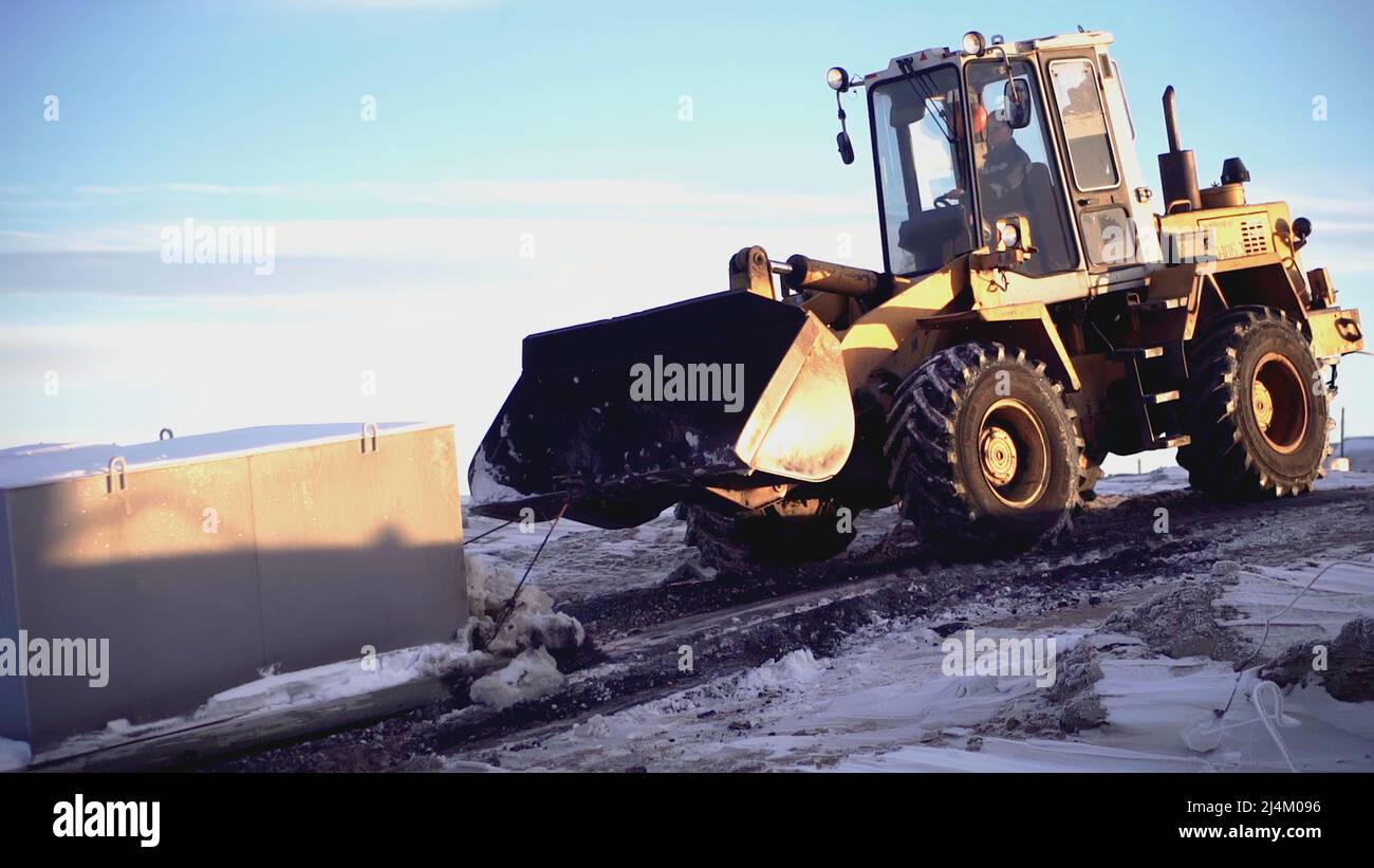 Tractor pulling boat on trailer hi-res stock photography and images - Alamy
