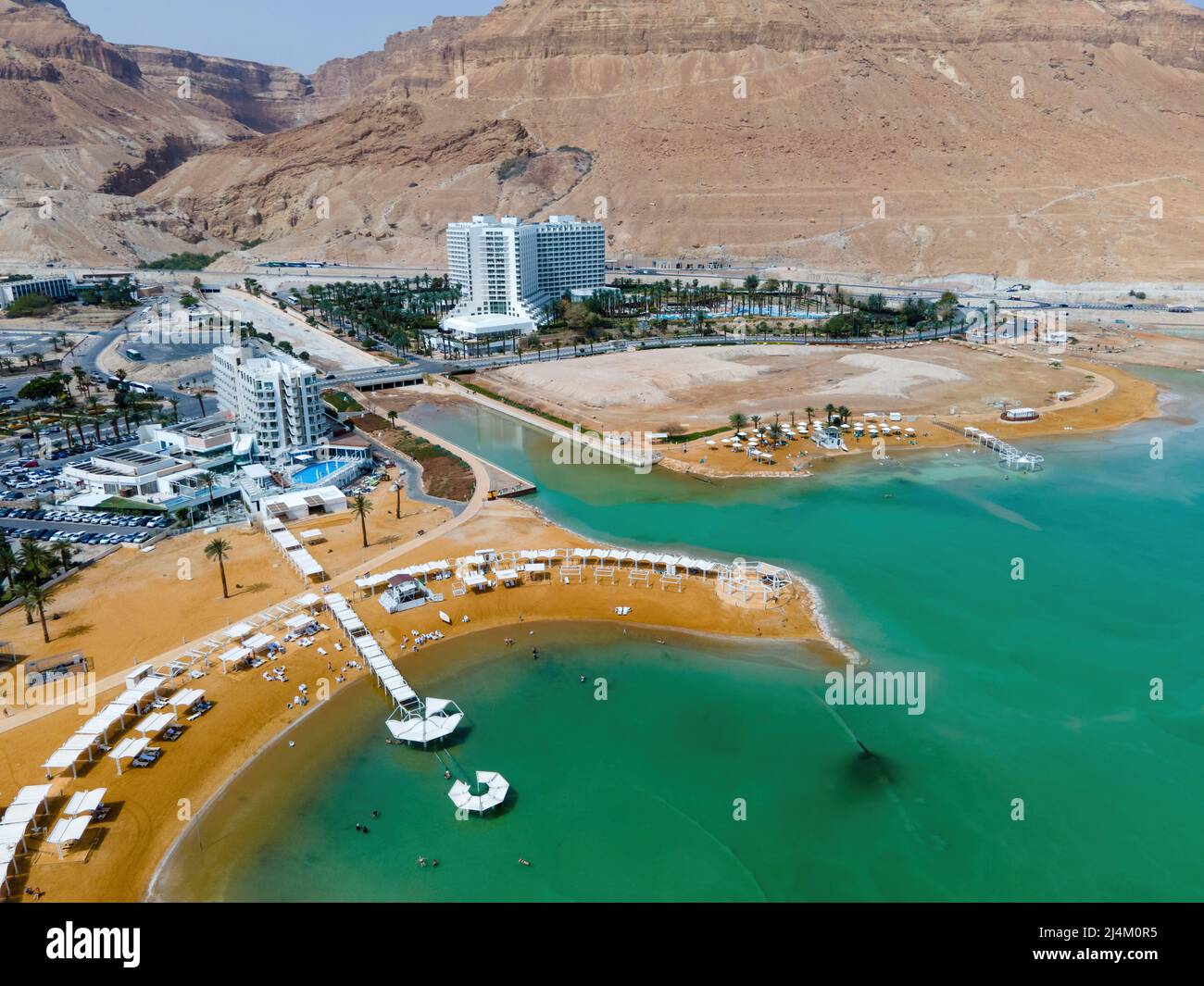 Dead sea beach shore tourist hotels, salt water, daylight Ein Bokek aerial view Stock Photo - Alamy