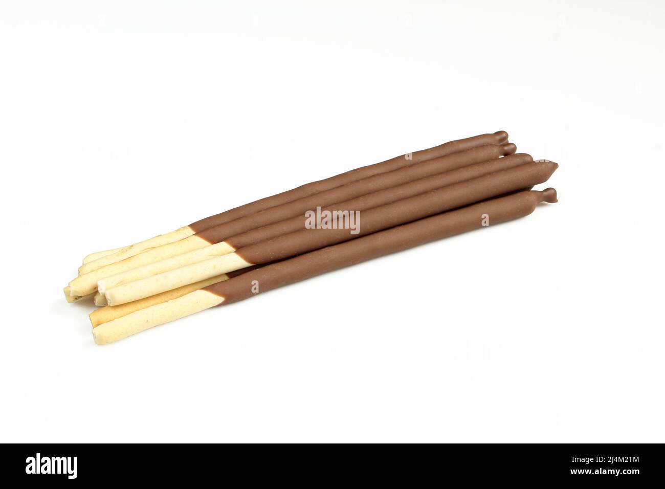 Biscuit sticks coated with milk chocolate Stock Photo - Alamy