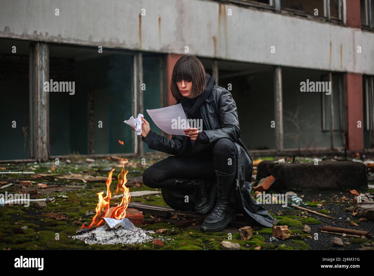 Woman burn paper flame hi-res stock photography and images - Alamy