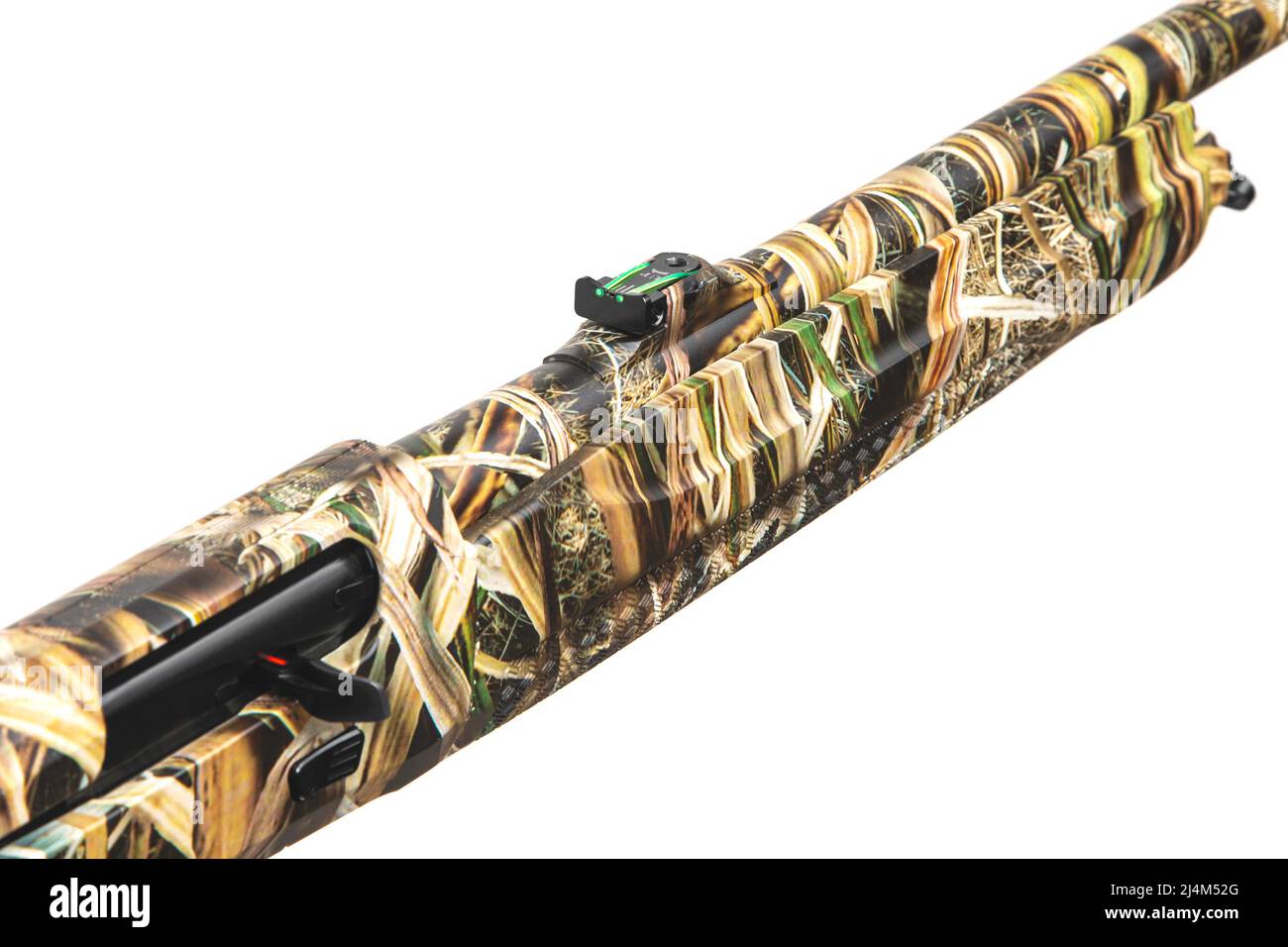 Pump-action 12 gauge shotgun isolated on a white background. Close-up ...