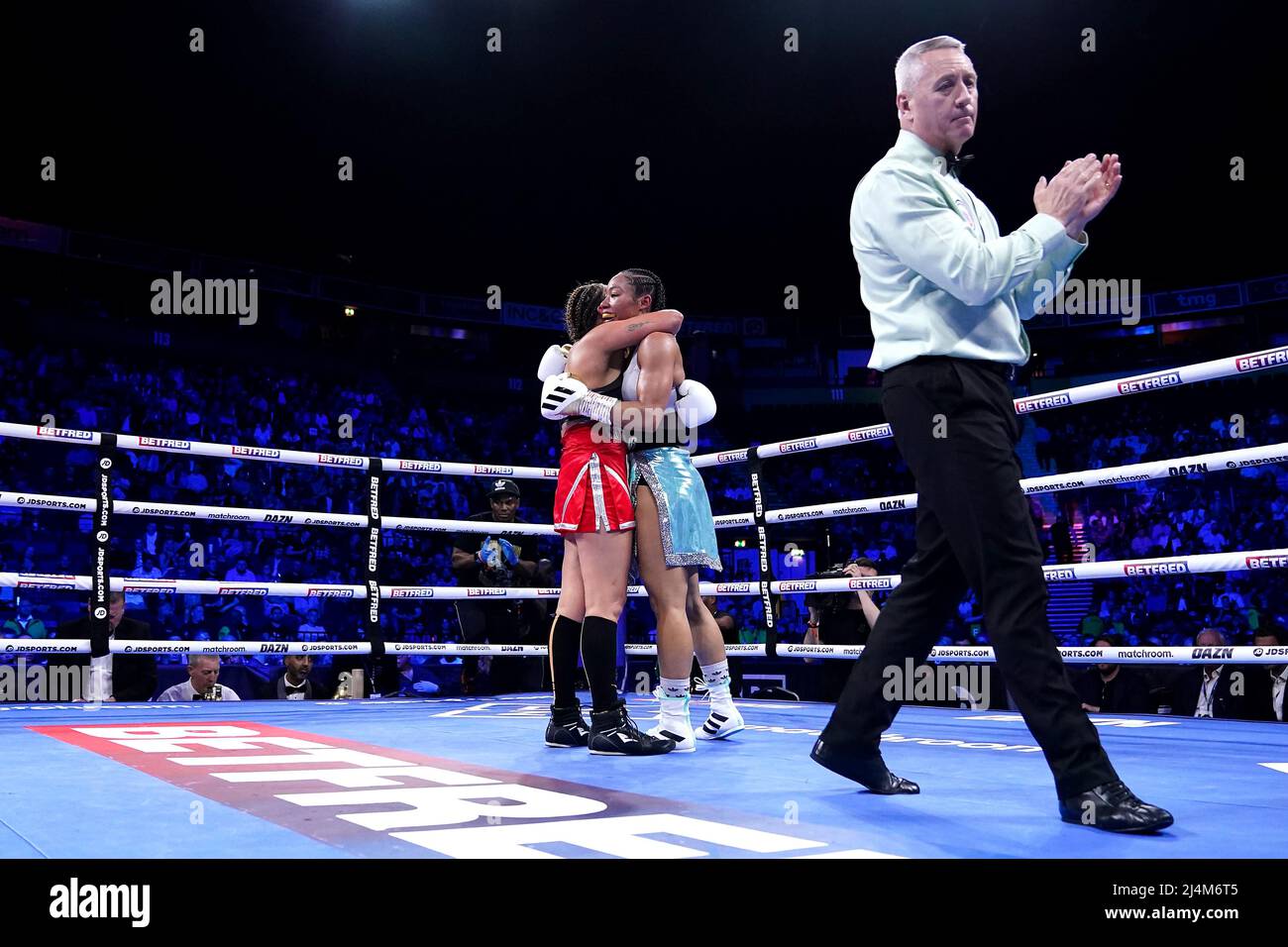 Alycia Baumgardner (right) and Edith Soledad Matthysse hug after the ...
