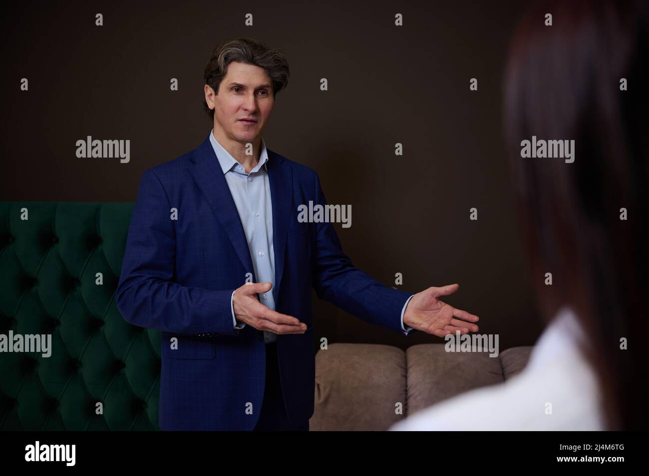 Confident sales rep, retail manager, assistant in upholstered furniture ...