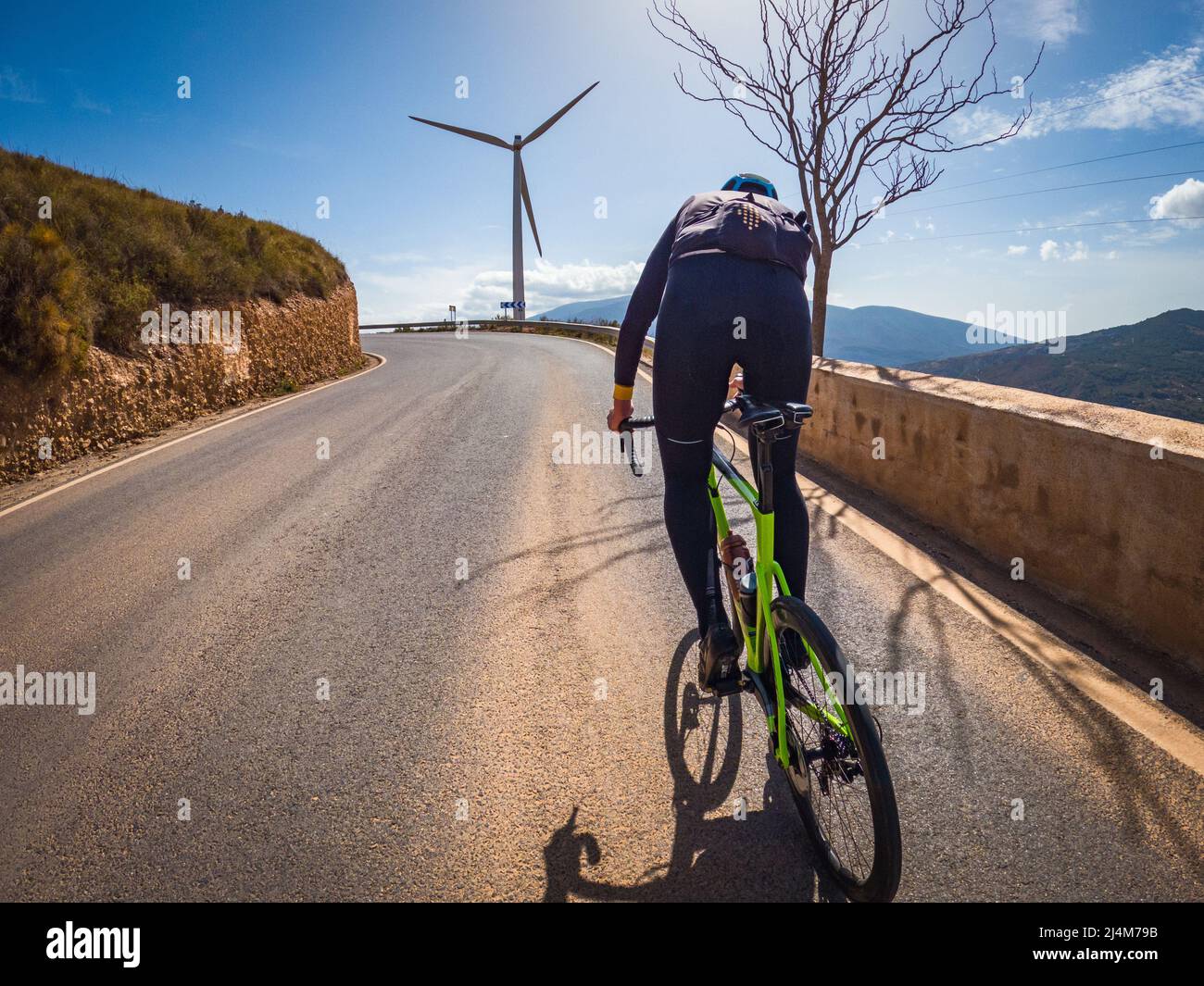 Man pedaling a bicycle hi-res stock photography and images - Alamy