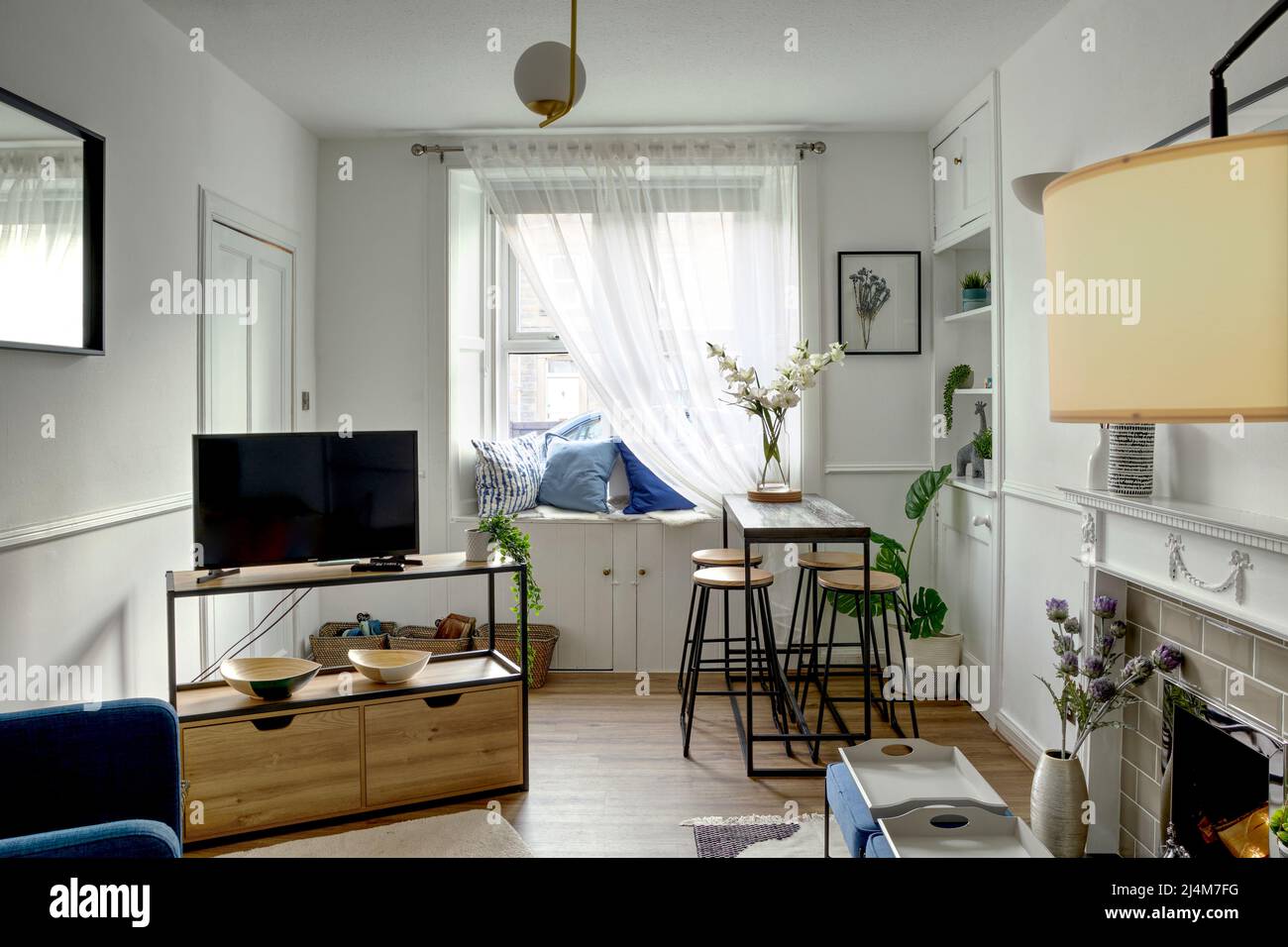 fwhite fireplace in a stylish white home, Interior Design Stock Photo ...