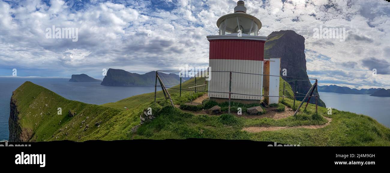 Beautiful aerial view of the Kallur Lighthouse in the Faroe Islands ...