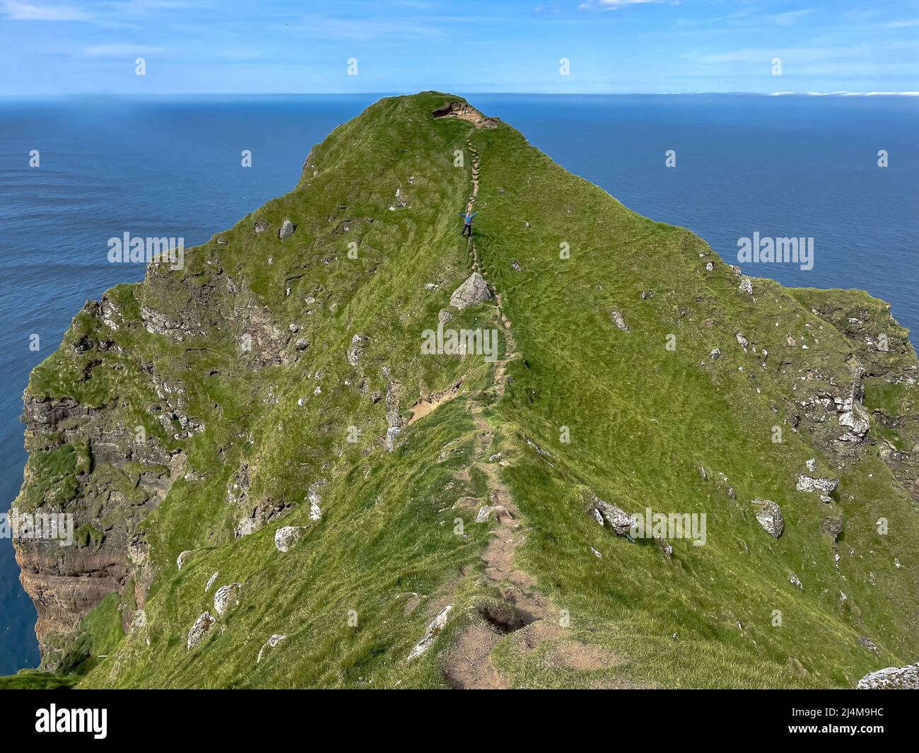 Beautiful aerial view of the Kallur Lighthouse in the Faroe Islands ...