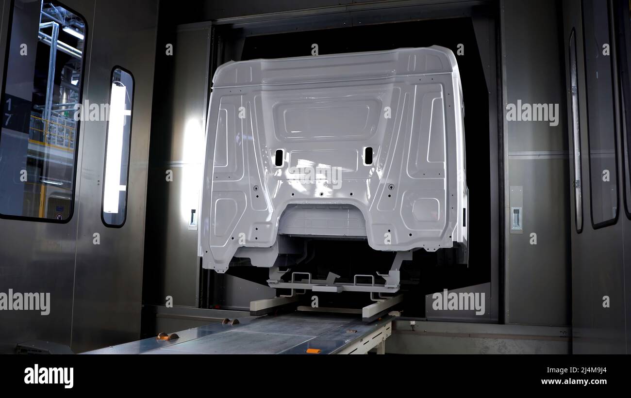 Process of truck car automated assembly, machine industry. Scene. Metal ...