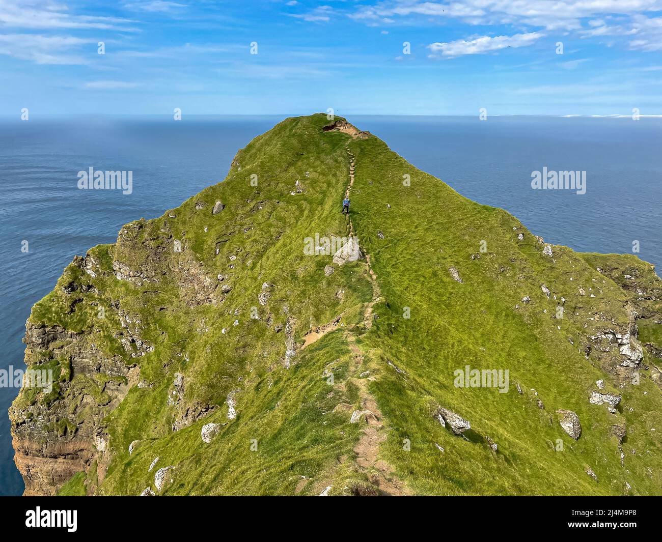 Beautiful aerial view of the Kallur Lighthouse in the Faroe Islands ...