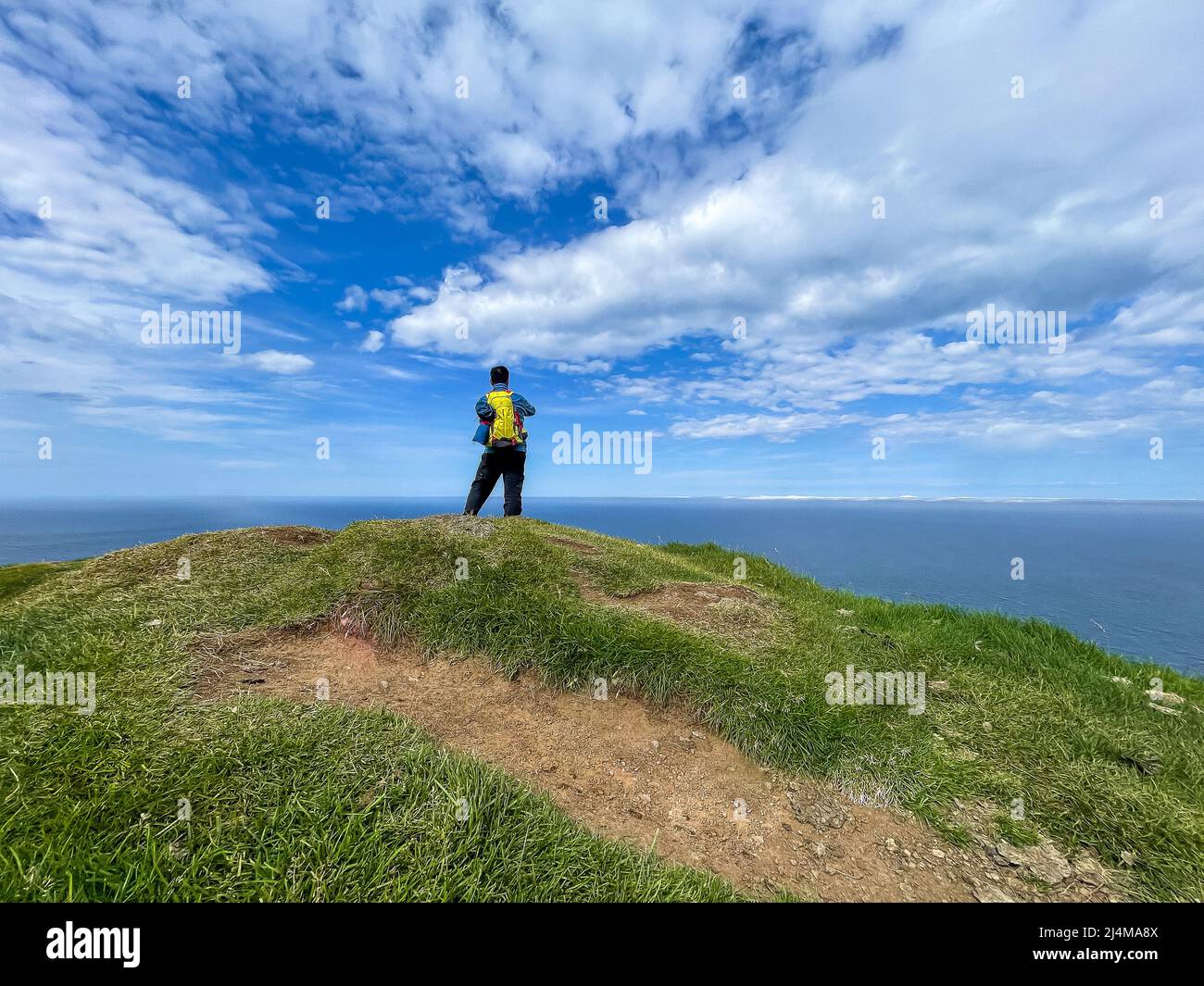 Beautiful aerial view of the Kallur Lighthouse in the Faroe Islands ...
