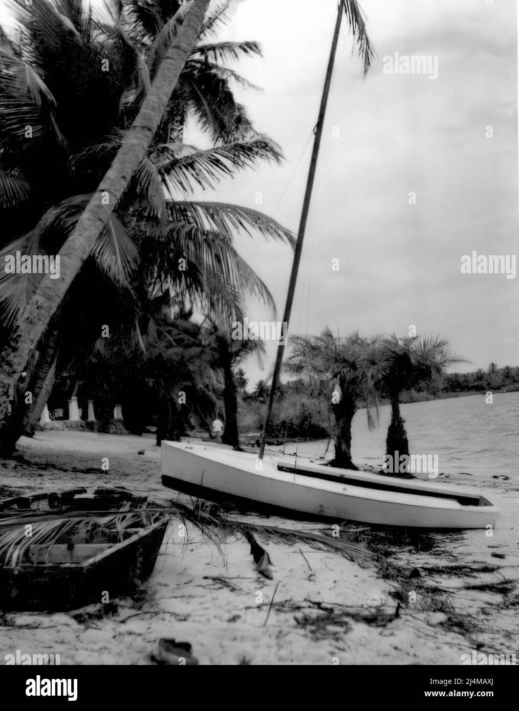 Boat sailing alone in Black and White Stock Photos & Images - Alamy