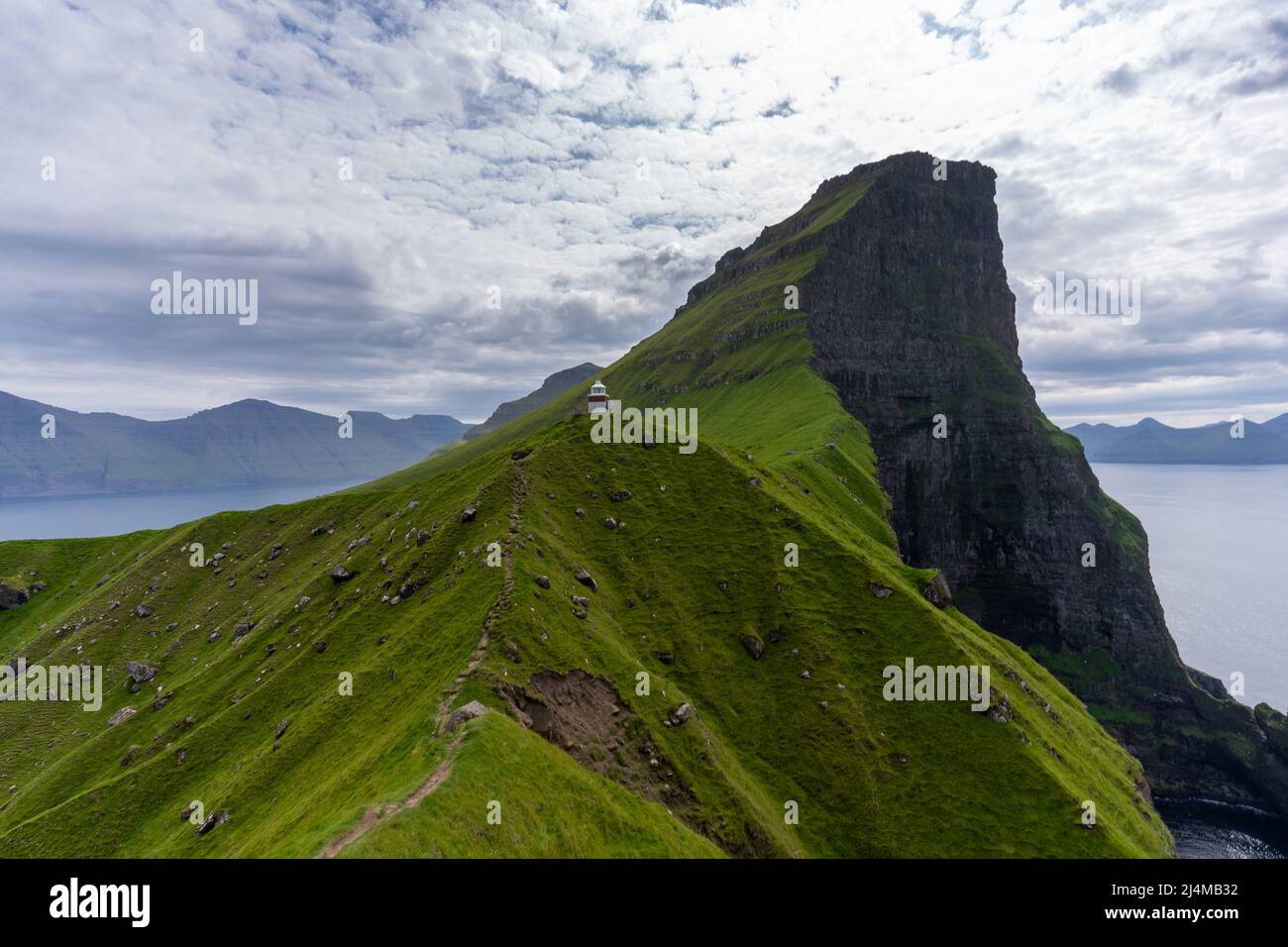 Beautiful aerial view of the Kallur Lighthouse in the Faroe Islands ...