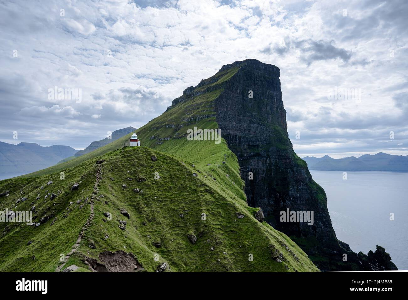 Beautiful aerial view of the Kallur Lighthouse in the Faroe Islands ...
