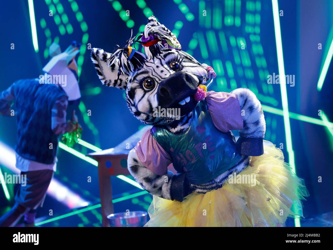 Cologne, Germany. 16th Apr, 2022. The character "The Zebra" is on stage ...