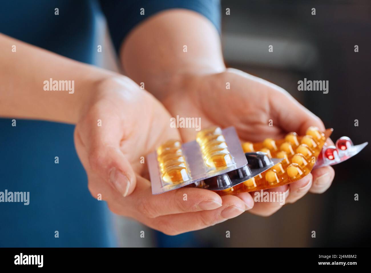 Vitamins And Supplements. Closeup Of Woman Hands Holding Variety Of ...