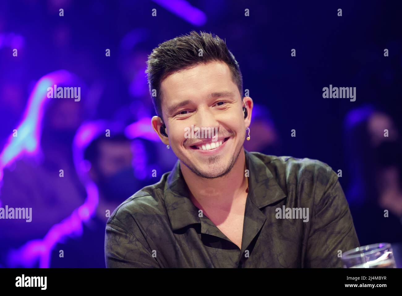 Cologne, Germany. 16th Apr, 2022. Nico Santos, singer, supports the ...