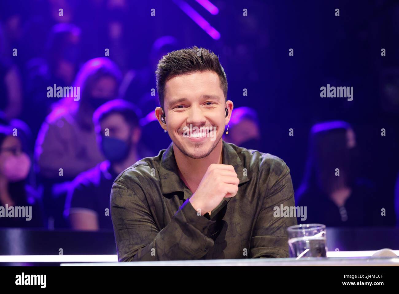 Cologne, Germany. 16th Apr, 2022. Nico Santos, singer, supports the ...