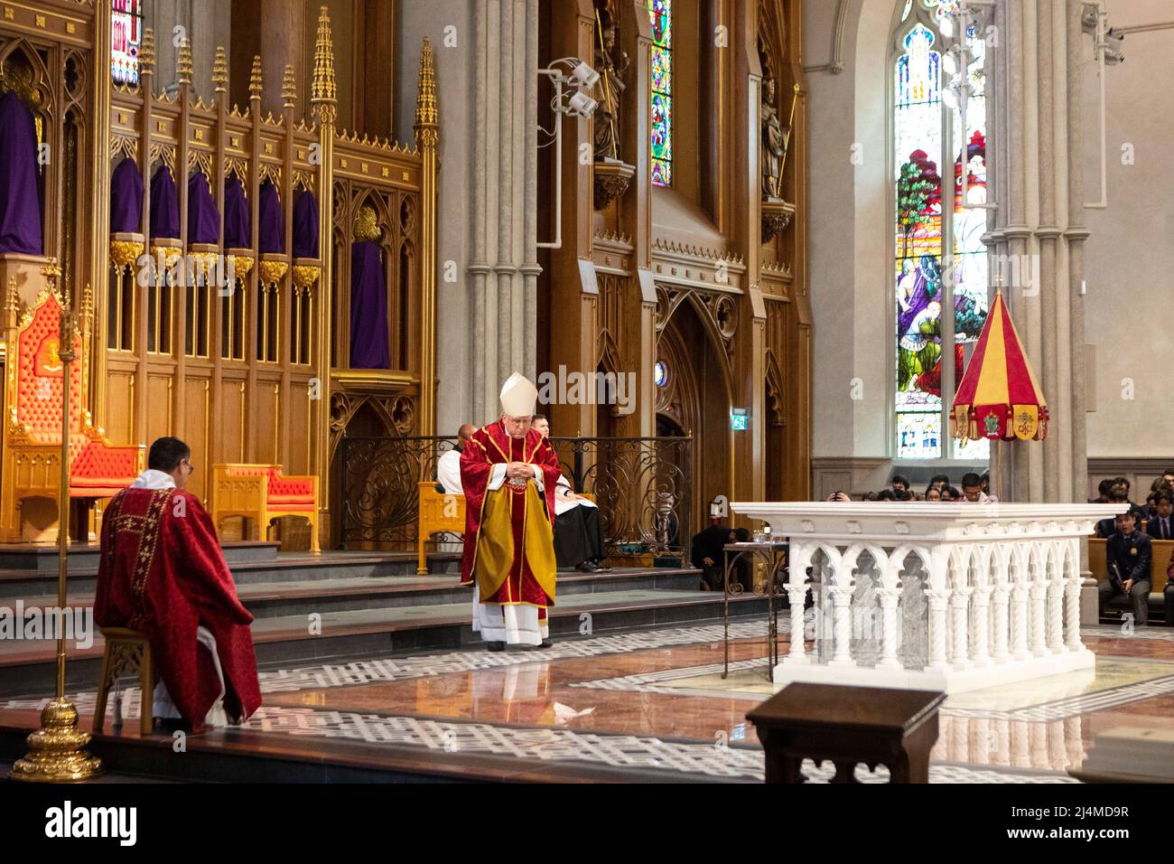 Cardinal Thomas Collins, the Archbishop of Toronto, walks to the pulpit ...