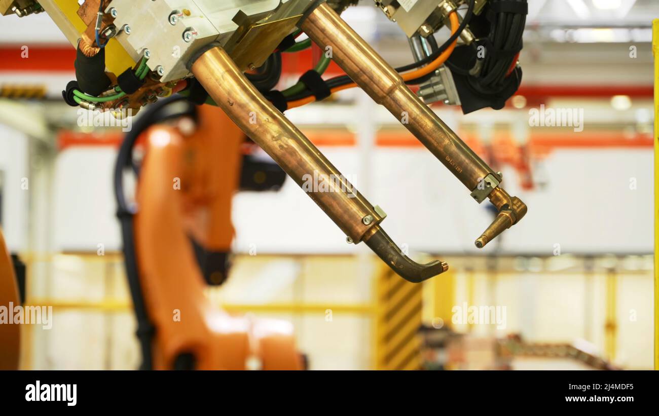 Latest technology in machine production. Scene. Robotic machines ...