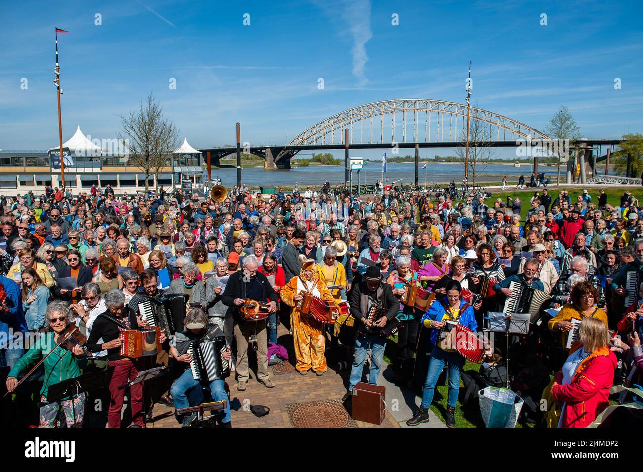 A view of the musicians gathered at the Waalkade before the concert ...