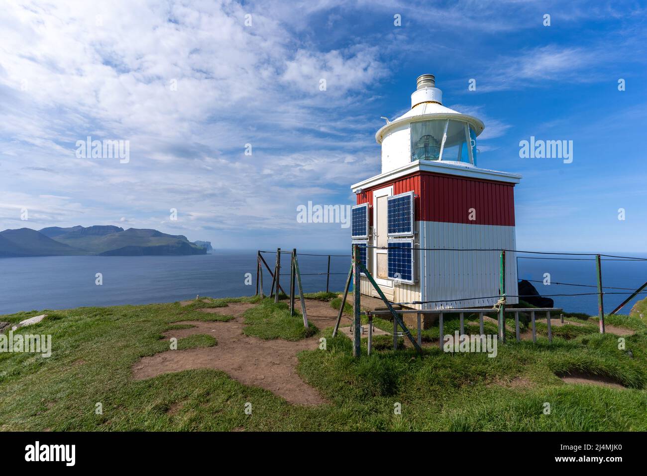 Beautiful aerial view of the Kallur Lighthouse in the Faroe Islands ...