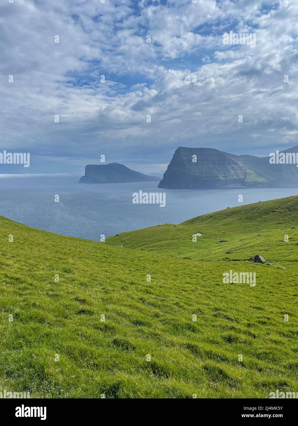 Beautiful aerial view of the Kallur Lighthouse in the Faroe Islands ...