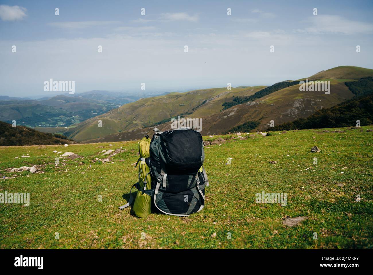pilgrim's backpack with a tent on the way to santiago Stock Photo - Alamy
