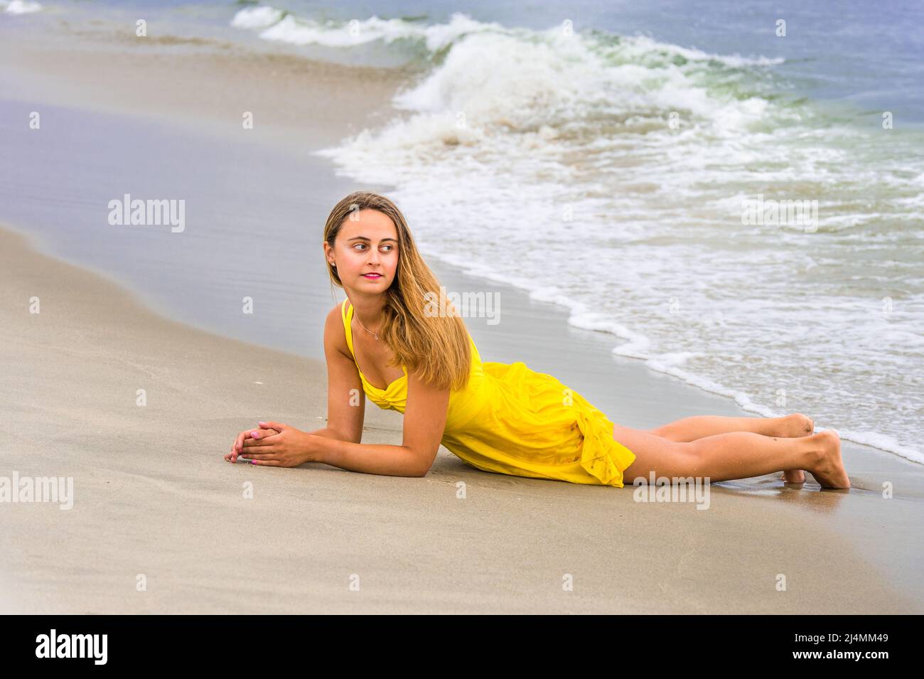 Wearing yellow sundress dress hi-res stock photography and images - Alamy