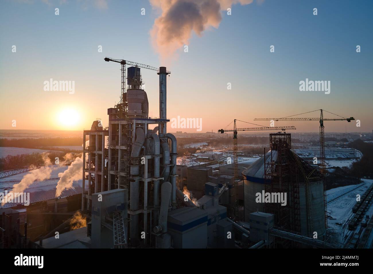 Aerial view of cement factory with high concrete plant structure and ...