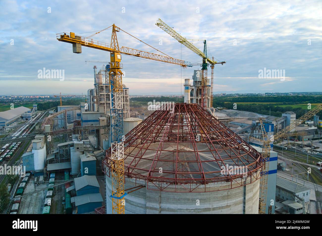 Aerial view of cement factory under construction with high concrete ...