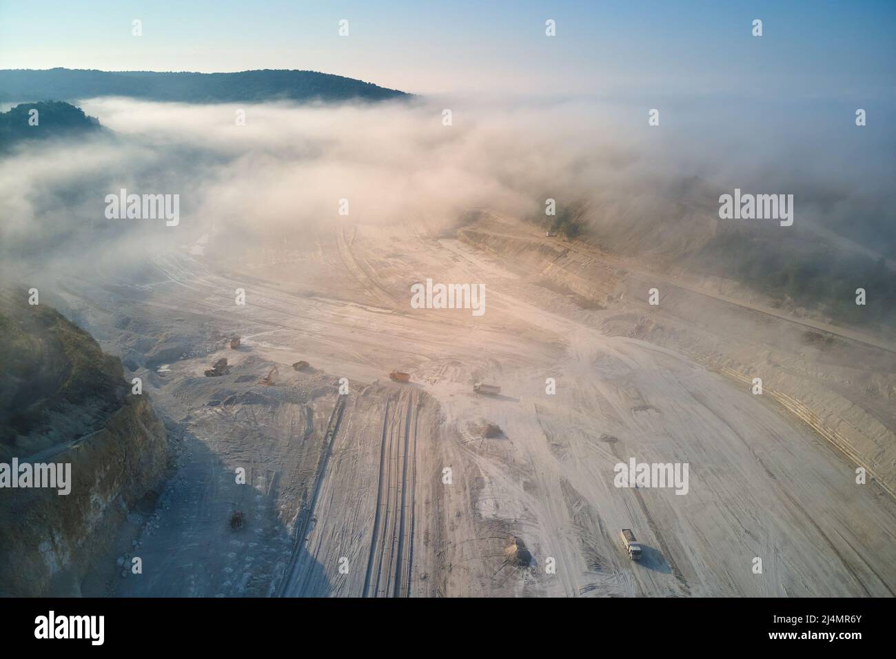 Aerial view of open pit mining site of limestone materials extraction ...