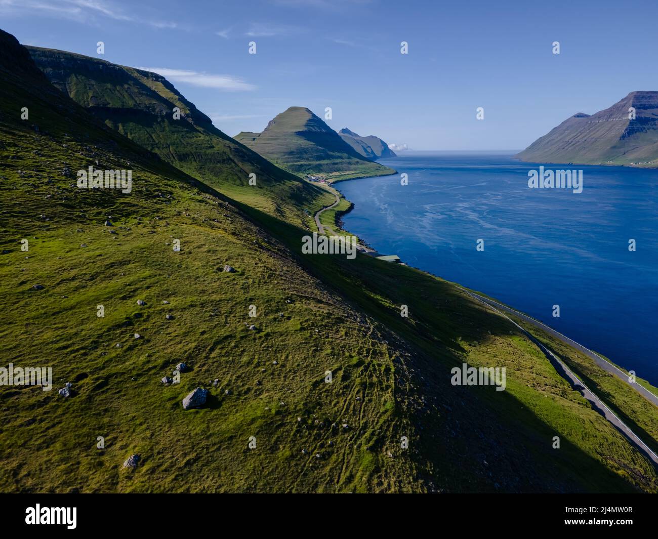 Beautiful aerial view of the Kallur Lighthouse in the Faroe Islands ...