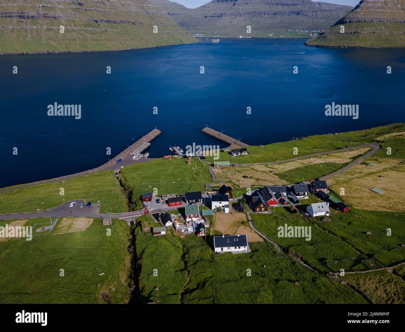 Beautiful aerial view of the Kallur Lighthouse in the Faroe Islands ...