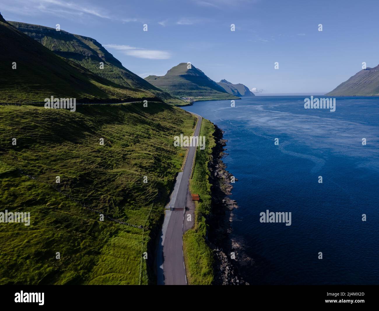 Beautiful aerial view of the Kallur Lighthouse in the Faroe Islands ...