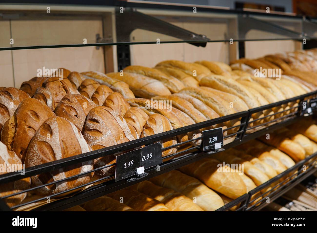Variety of fresh bakery products on the shelf at store Stock Photo - Alamy