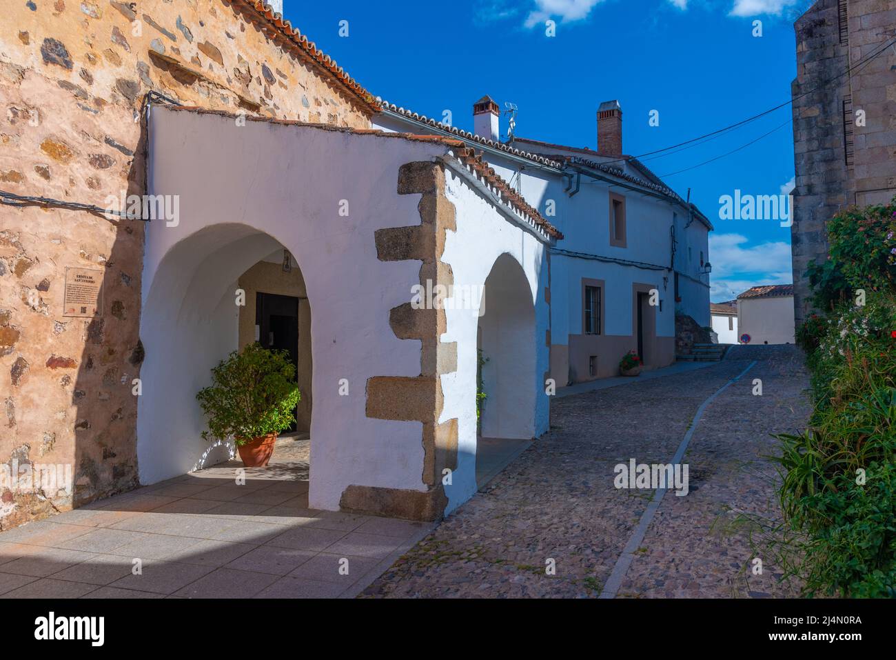 Narrow street in the old town of Spanish city Caceres Stock Photo - Alamy