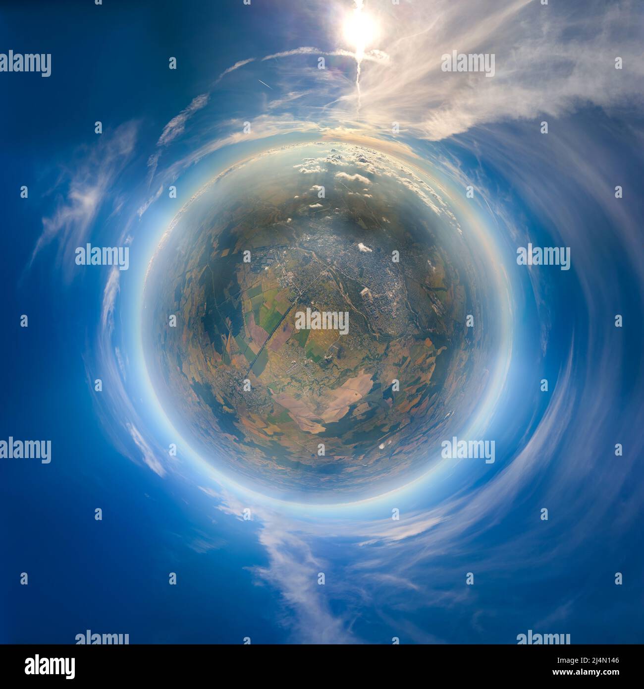 Aerial view from airplane window at high altitude of little planet ...