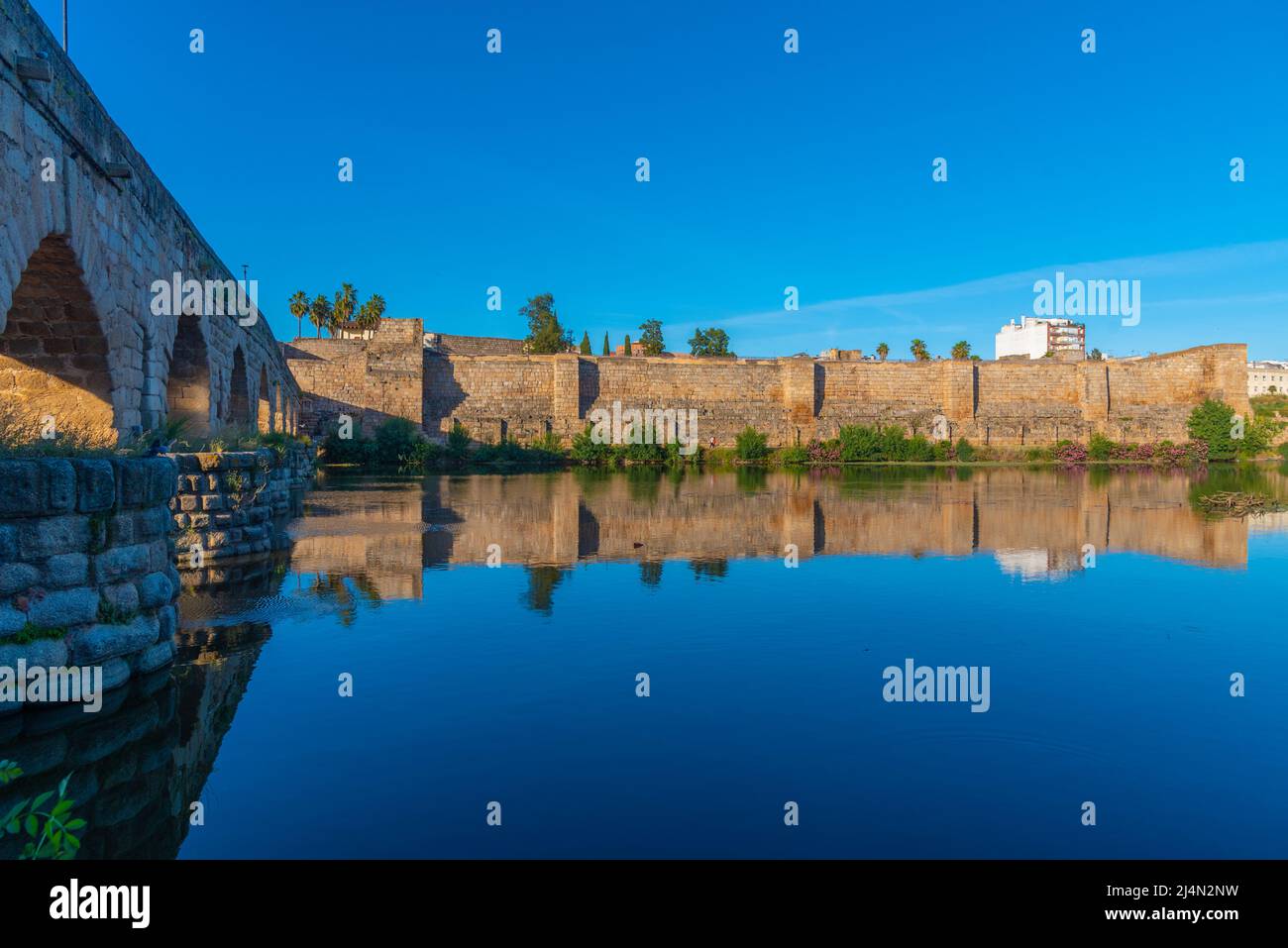 Alcazaba fortress alongside river Guadiana in Merida, Spain Stock Photo ...