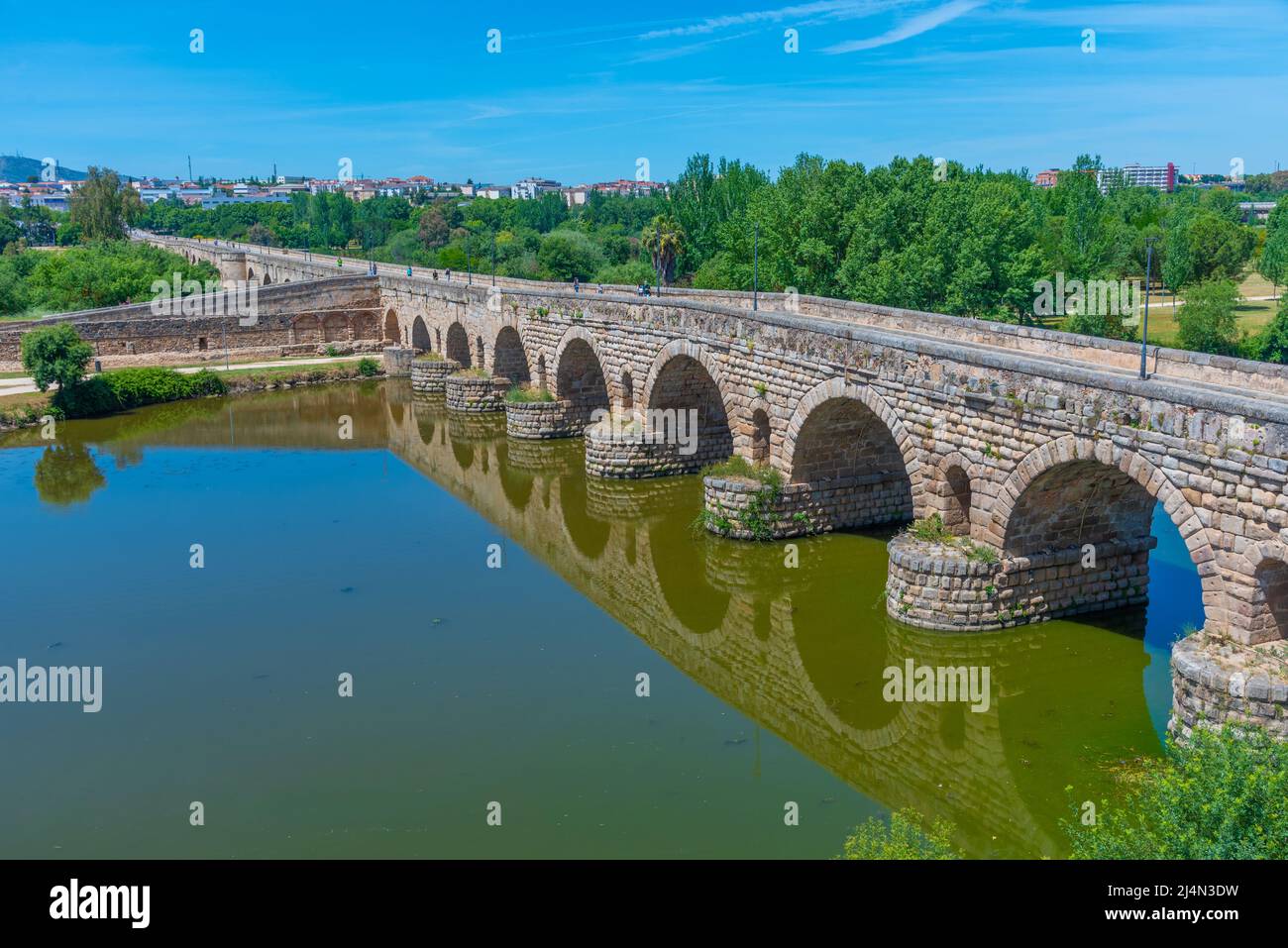 Roman bridge over river Guadiana leading to Alcazaba fortress in Merida ...