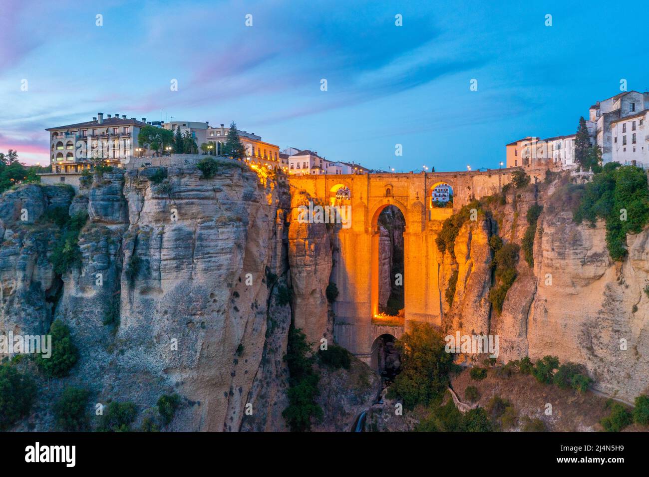 Sunset view of Puente nuevo bridge in Spanish town Ronda Stock Photo ...