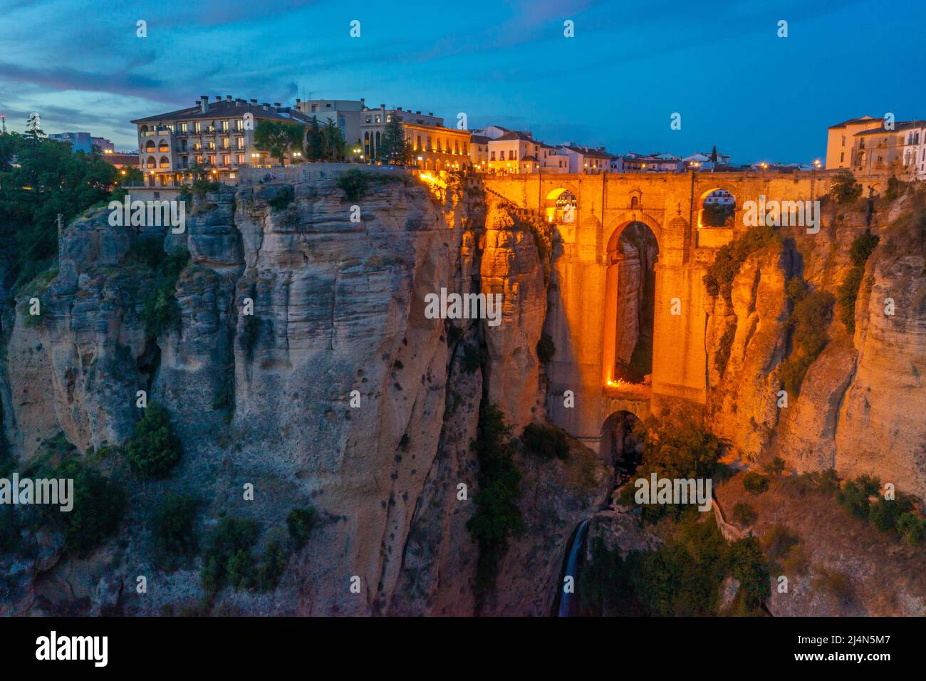 Sunset view of Puente nuevo bridge in Spanish town Ronda Stock Photo ...