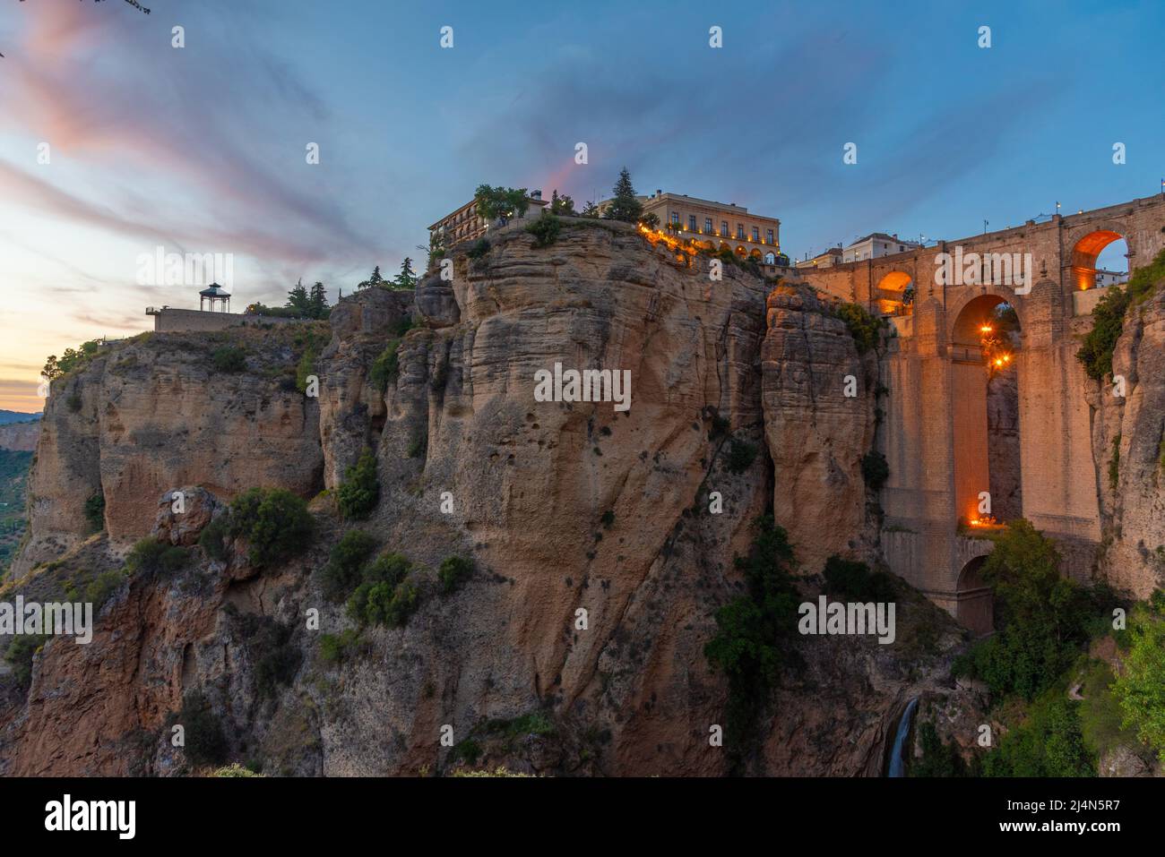 Sunset view of Puente nuevo bridge in Spanish town Ronda Stock Photo ...