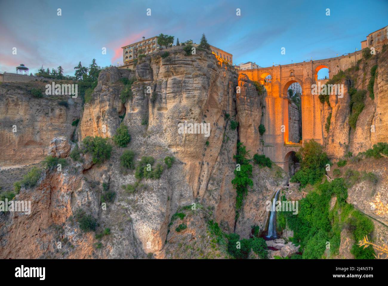 Sunset view of Puente nuevo bridge in Spanish town Ronda Stock Photo ...